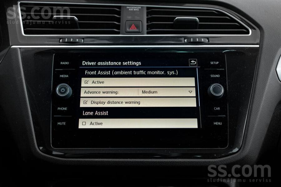 White Volkswagen Tiguan 2019 in Riga, with an engine capacity of 2.00 L and mileage of 195 thousand km for 13000 €, photo 18 on AUTOMOTO.COM.LV