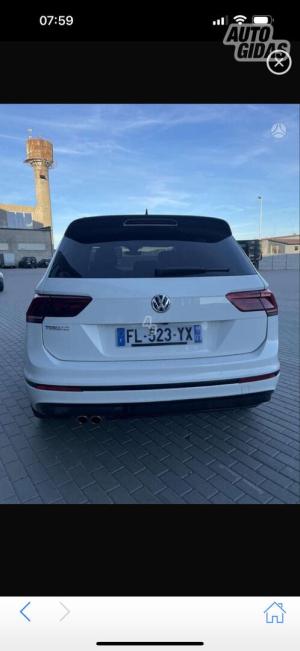 White Volkswagen Tiguan 2019 in Kaunas, with an engine capacity of 2.00 L and mileage of 364 thousand km for 15500 €, photo 14 on AUTOMOTO.COM.LV