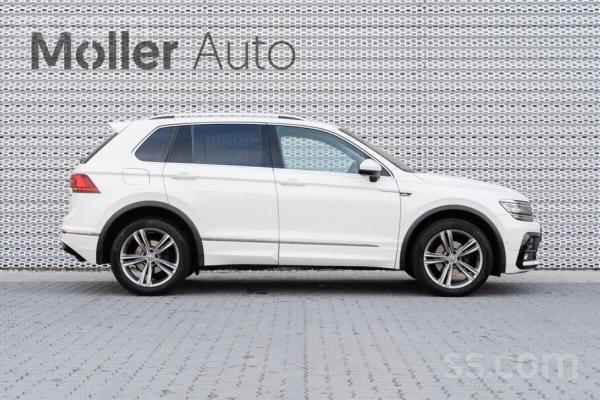 White Volkswagen Tiguan 2019 in Riga, with an engine capacity of 2.00 L and mileage of 164 thousand km for 22150 €, photo 6 on AUTOMOTO.COM.LV