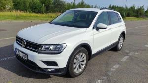 White Volkswagen Tiguan 2019 in Vilnius, with an engine capacity of 1.50 L and mileage of 123 thousand km for 17950 €, photo  on AUTOMOTO.COM.LV