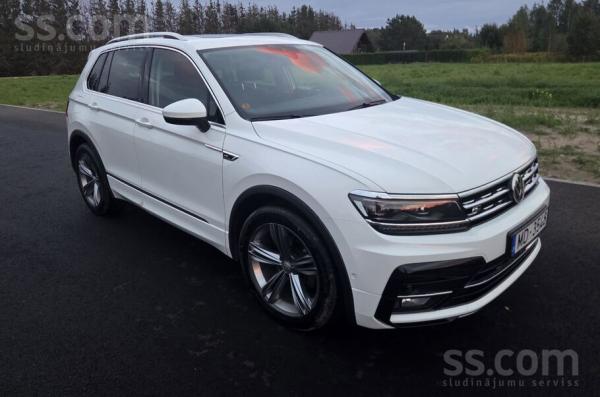 White Volkswagen Tiguan 2019 in Riga, with an engine capacity of 2.00 L and mileage of 210 thousand km for 17900 €, photo 3 on AUTOMOTO.COM.LV