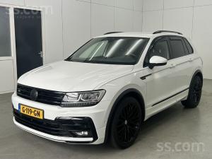 White Volkswagen Tiguan 2019 in Riga, with an engine capacity of 1.50 L and mileage of 212 thousand km for 19300 €, photo 4 on AUTOMOTO.COM.LV