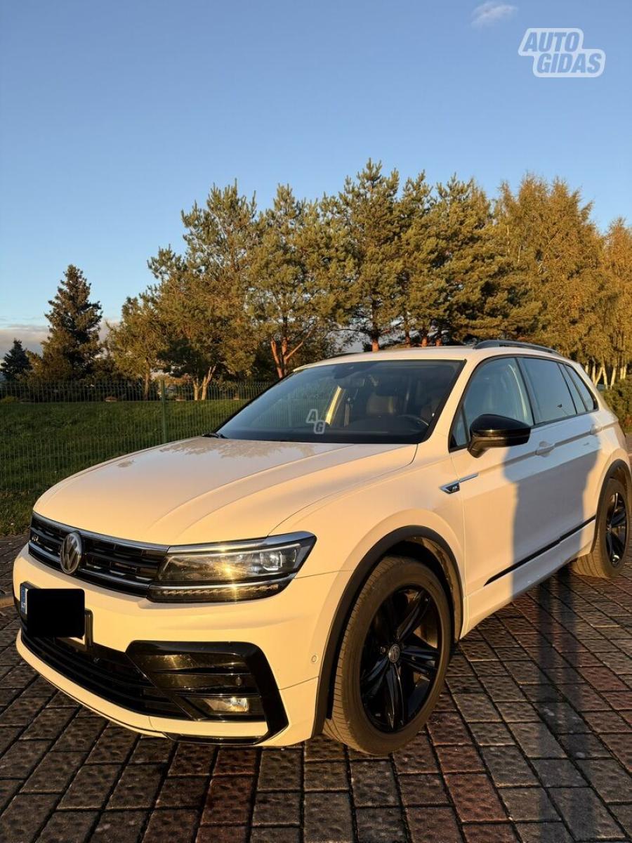 White Volkswagen Tiguan 2019 in Silute, with an engine capacity of 2.00 L and mileage of 100 thousand km for 22000 €, photo 1 on AUTOMOTO.COM.LV