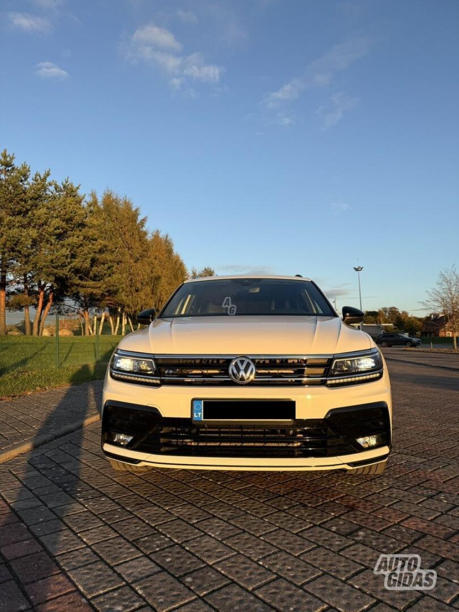 White Volkswagen Tiguan 2019 in Silute, with an engine capacity of 2.00 L and mileage of 100 thousand km for 22000 €, photo 4 on AUTOMOTO.COM.LV