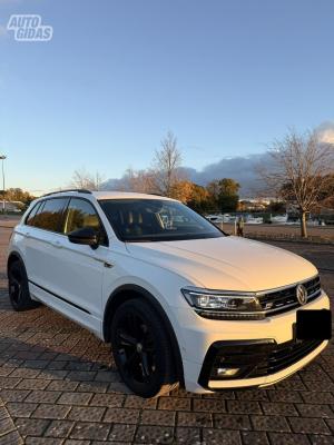 White Volkswagen Tiguan 2019 in Silute, with an engine capacity of 2.00 L and mileage of 100 thousand km for 22000 €, photo 8 on AUTOMOTO.COM.LV