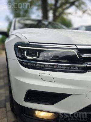 White Volkswagen Tiguan 2020 in Riga, with an engine capacity of 2.00 L and mileage of 83 thousand km for 21400 €, photo  on AUTOMOTO.COM.LV