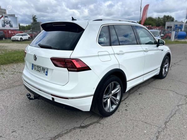 White Volkswagen Tiguan 2020 in Panevezys, with an engine capacity of 1.97 L and mileage of 208 thousand km for 16500 €, photo 9 on AUTOMOTO.COM.LV