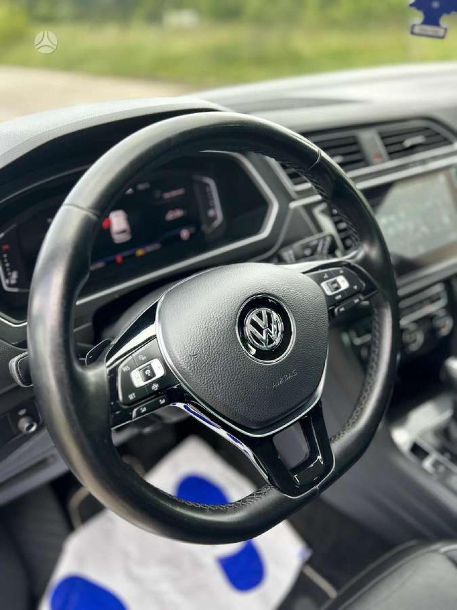 White Volkswagen Tiguan 2020 in Panevezys, with an engine capacity of 1.97 L and mileage of 208 thousand km for 16500 €, photo 23 on AUTOMOTO.COM.LV