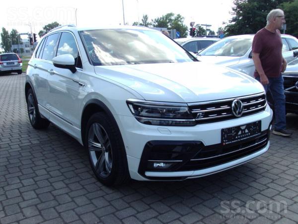 White Volkswagen Tiguan 2020 in Riga, with an engine capacity of 2.00 L and mileage of 211 thousand km for 23000 €, photo 2 on AUTOMOTO.COM.LV