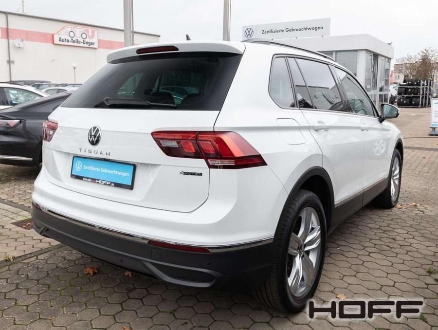 White Volkswagen Tiguan 2021 in Kaunas, with an engine capacity of 2.00 L and mileage of 48 thousand km for 32674 €, photo 2 on AUTOMOTO.COM.LV