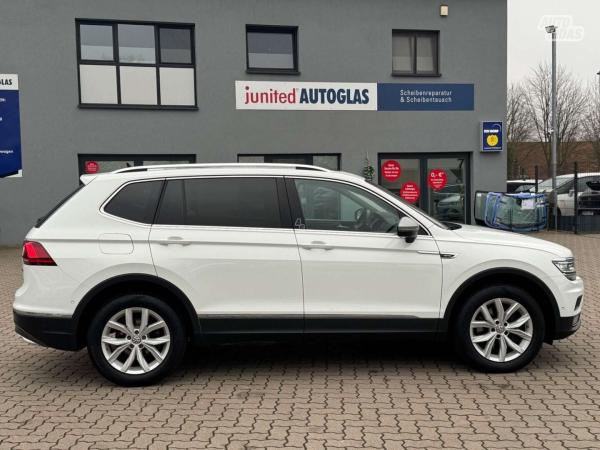 White Volkswagen Tiguan 2021 in Kaunas, with an engine capacity of 2.00 L and mileage of 91 thousand km for 33197 €, photo 6 on AUTOMOTO.COM.LV