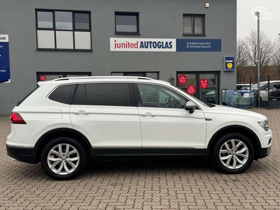 White Volkswagen Tiguan 2021 in Kaunas, with an engine capacity of 2.00 L and mileage of 91 thousand km for 33197 €, photo 6 on AUTOMOTO.COM.LV