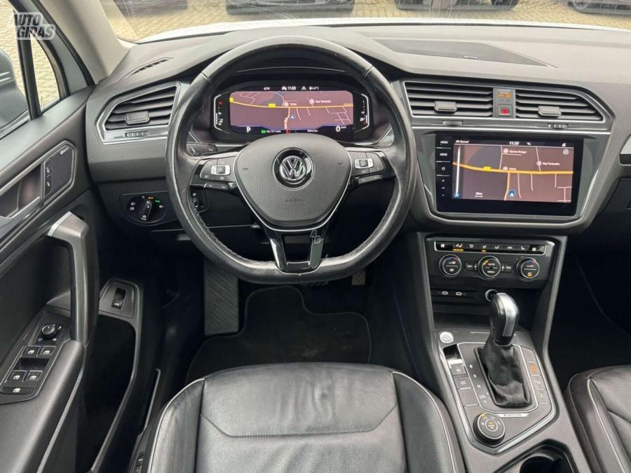 White Volkswagen Tiguan 2021 in Kaunas, with an engine capacity of 2.00 L and mileage of 91 thousand km for 33197 €, photo 14 on AUTOMOTO.COM.LV