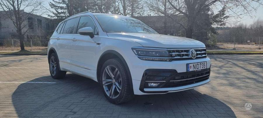 White Volkswagen Tiguan 2021 in Vilnius, with an engine capacity of 1.98 L and mileage of 81 thousand km for 26500 €, photo 1 on AUTOMOTO.COM.LV