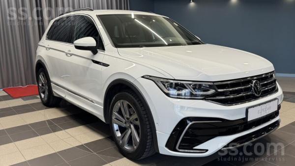 White Volkswagen Tiguan 2021 in Riga, with an engine capacity of 1.50 L and mileage of 72 thousand km for 24990 €, photo 3 on AUTOMOTO.COM.LV