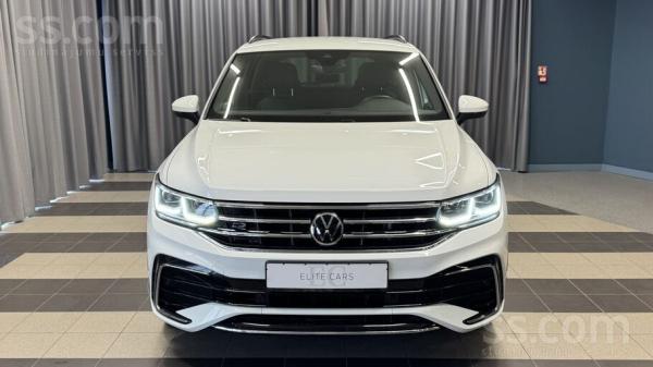 White Volkswagen Tiguan 2021 in Riga, with an engine capacity of 1.50 L and mileage of 72 thousand km for 24990 €, photo 8 on AUTOMOTO.COM.LV