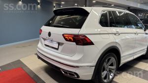 White Volkswagen Tiguan 2021 in Riga, with an engine capacity of 1.50 L and mileage of 72 thousand km for 24990 €, photo 10 on AUTOMOTO.COM.LV