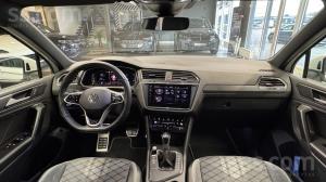 White Volkswagen Tiguan 2021 in Riga, with an engine capacity of 1.50 L and mileage of 72 thousand km for 24990 €, photo 15 on AUTOMOTO.COM.LV