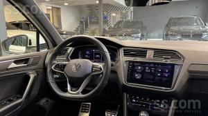 White Volkswagen Tiguan 2021 in Riga, with an engine capacity of 1.50 L and mileage of 72 thousand km for 24990 €, photo 16 on AUTOMOTO.COM.LV