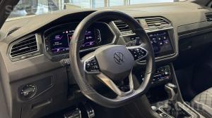 White Volkswagen Tiguan 2021 in Riga, with an engine capacity of 1.50 L and mileage of 72 thousand km for 24990 €, photo 19 on AUTOMOTO.COM.LV