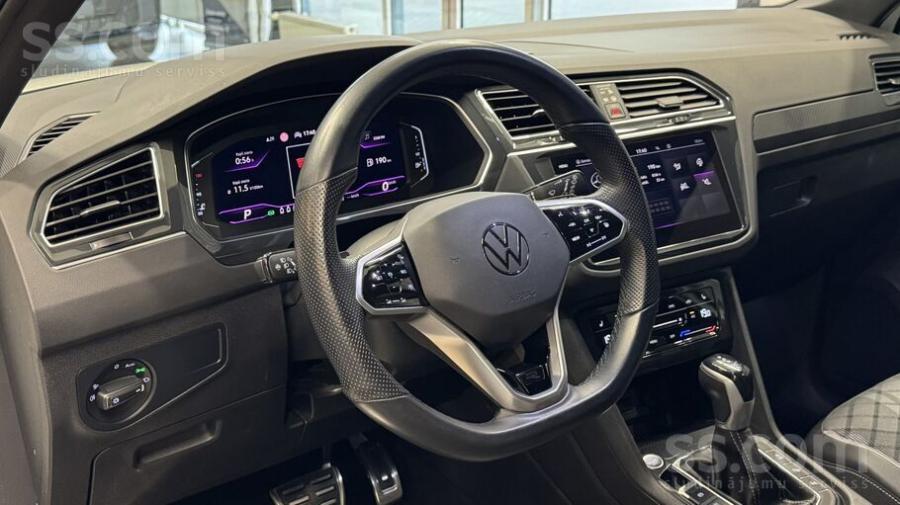 White Volkswagen Tiguan 2021 in Riga, with an engine capacity of 1.50 L and mileage of 72 thousand km for 24990 €, photo 19 on AUTOMOTO.COM.LV