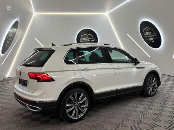 White Volkswagen Tiguan 2021 in Marijampole, with an engine capacity of 1.97 L and mileage of 307 thousand km for 18750 €, photo 7 on AUTOMOTO.COM.LV