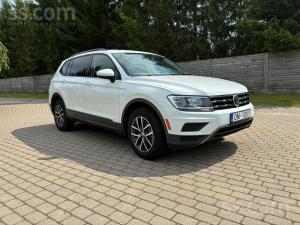 White Volkswagen Tiguan 2021 in Riga, with an engine capacity of 2.00 L and mileage of 97 thousand km for 18500 €, photo  on AUTOMOTO.COM.LV