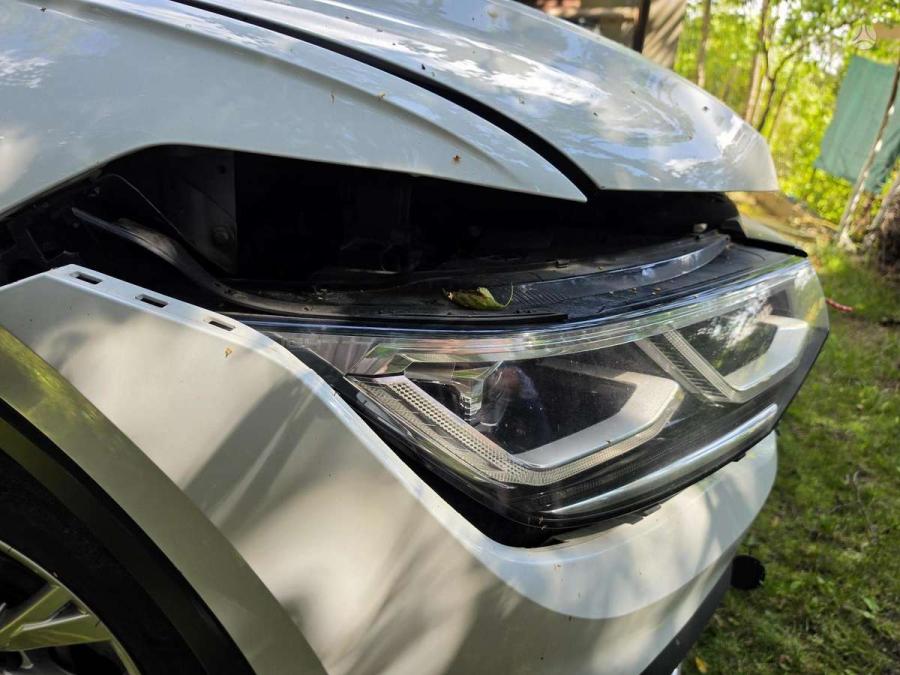 White Volkswagen Tiguan 2021 in Vilnius, with an engine capacity of 1.40 L and mileage of 98 thousand km for 18700 €, photo 15 on AUTOMOTO.COM.LV