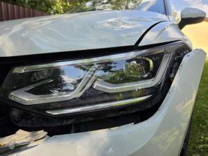 White Volkswagen Tiguan 2021 in Vilnius, with an engine capacity of 1.40 L and mileage of 98 thousand km for 18700 €, photo 16 on AUTOMOTO.COM.LV