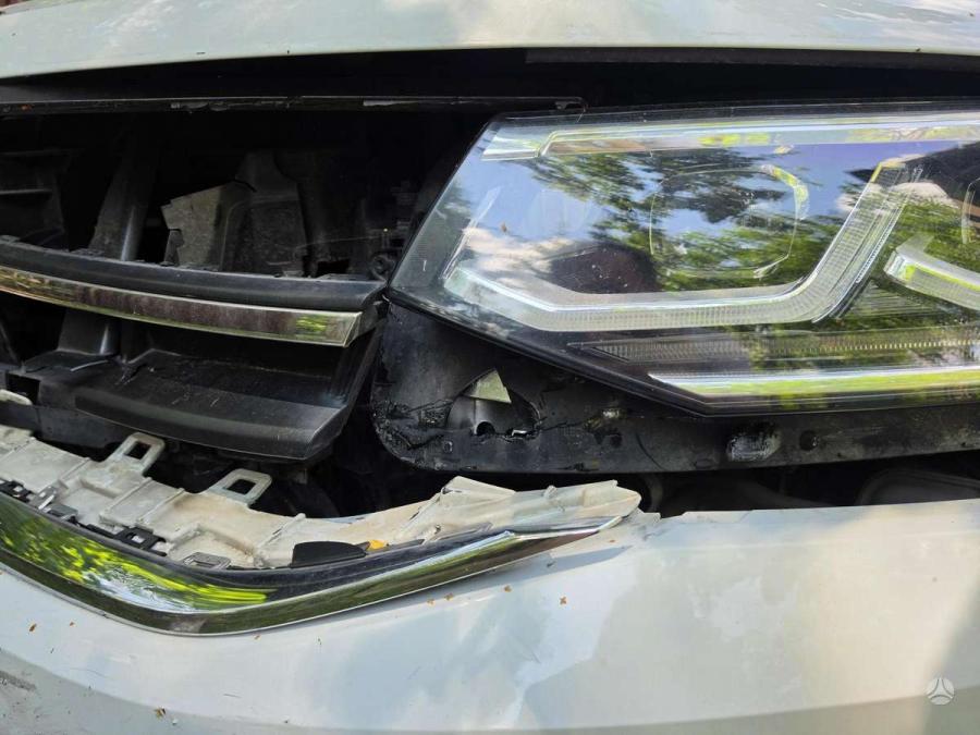 White Volkswagen Tiguan 2021 in Vilnius, with an engine capacity of 1.40 L and mileage of 98 thousand km for 18700 €, photo 17 on AUTOMOTO.COM.LV
