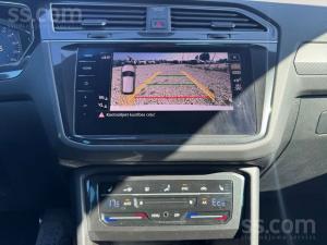 White Volkswagen Tiguan 2021 in Riga, with an engine capacity of 1.40 L and mileage of 123 thousand km for 23900 €, photo 15 on AUTOMOTO.COM.LV