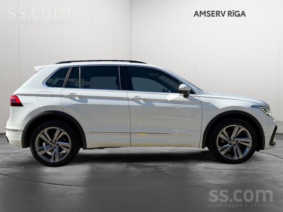 White Volkswagen Tiguan 2021 in Riga, with an engine capacity of 1.40 L and mileage of 123 thousand km for 23900 €, photo 17 on AUTOMOTO.COM.LV
