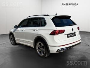 White Volkswagen Tiguan 2021 in Riga, with an engine capacity of 1.40 L and mileage of 123 thousand km for 23900 €, photo 18 on AUTOMOTO.COM.LV