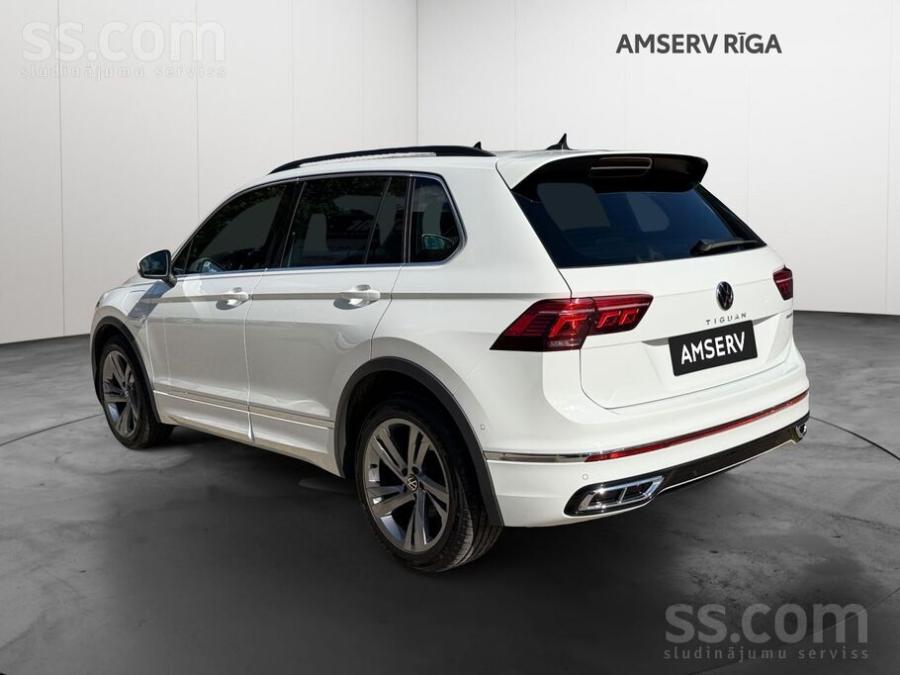 White Volkswagen Tiguan 2021 in Riga, with an engine capacity of 1.40 L and mileage of 123 thousand km for 23900 €, photo 18 on AUTOMOTO.COM.LV