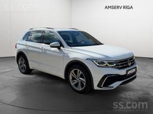 White Volkswagen Tiguan 2021 in Riga, with an engine capacity of 1.40 L and mileage of 123 thousand km for 23900 €, photo 19 on AUTOMOTO.COM.LV