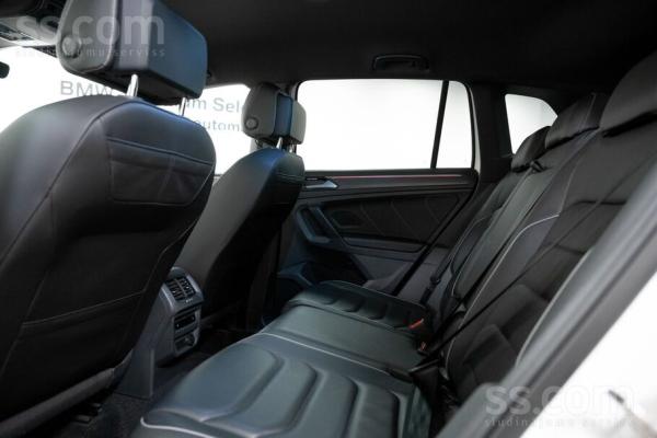 White Volkswagen Tiguan 2022 in Riga, with an engine capacity of 1.40 L and mileage of 85 thousand km for 29500 €, photo 7 on AUTOMOTO.COM.LV