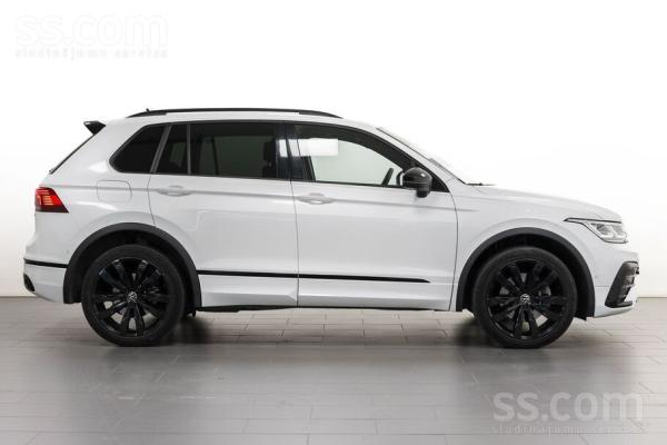 White Volkswagen Tiguan 2022 in Riga, with an engine capacity of 1.40 L and mileage of 85 thousand km for 29500 €, photo 9 on AUTOMOTO.COM.LV