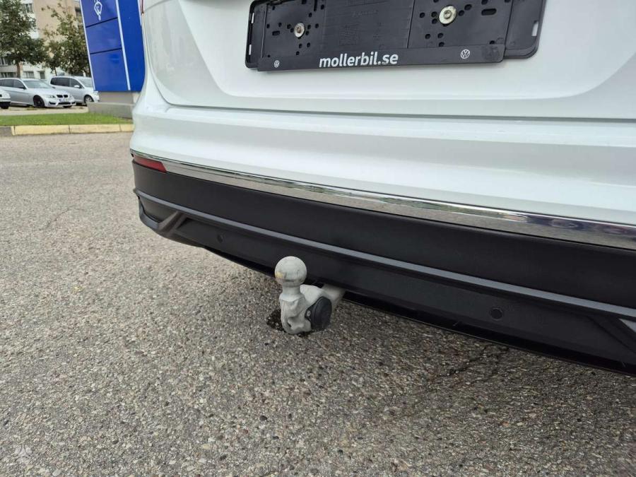 White Volkswagen Tiguan 2022 in Panevezys, with an engine capacity of 1.50 L and mileage of 336 thousand km for 14600 €, photo 28 on AUTOMOTO.COM.LV