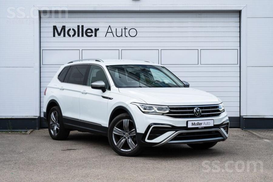 White Volkswagen Tiguan 2022 in Riga, with an engine capacity of 2.00 L and mileage of 86 thousand km for 28950 €, photo 4 on AUTOMOTO.COM.LV