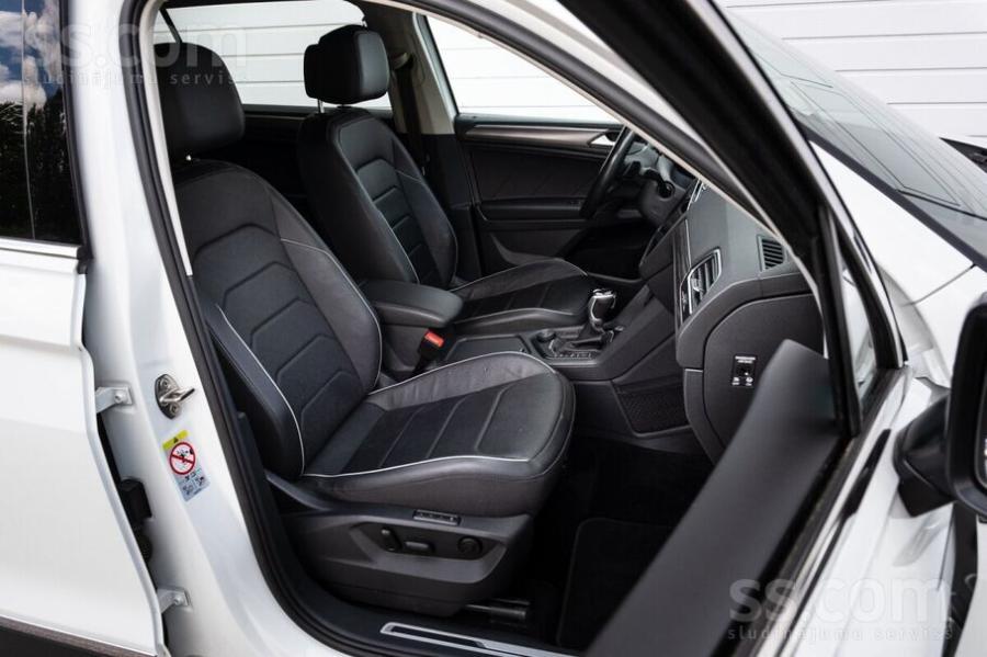 White Volkswagen Tiguan 2022 in Riga, with an engine capacity of 2.00 L and mileage of 86 thousand km for 28950 €, photo 14 on AUTOMOTO.COM.LV