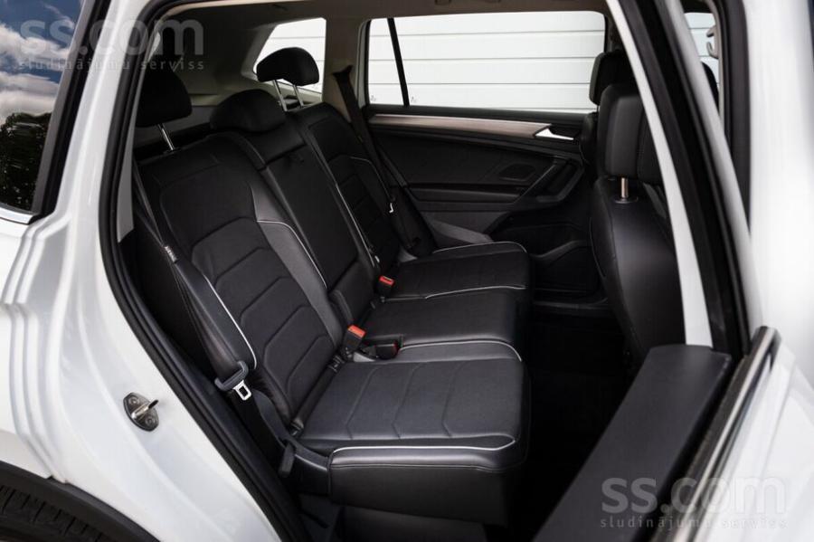 White Volkswagen Tiguan 2022 in Riga, with an engine capacity of 2.00 L and mileage of 86 thousand km for 28950 €, photo 16 on AUTOMOTO.COM.LV