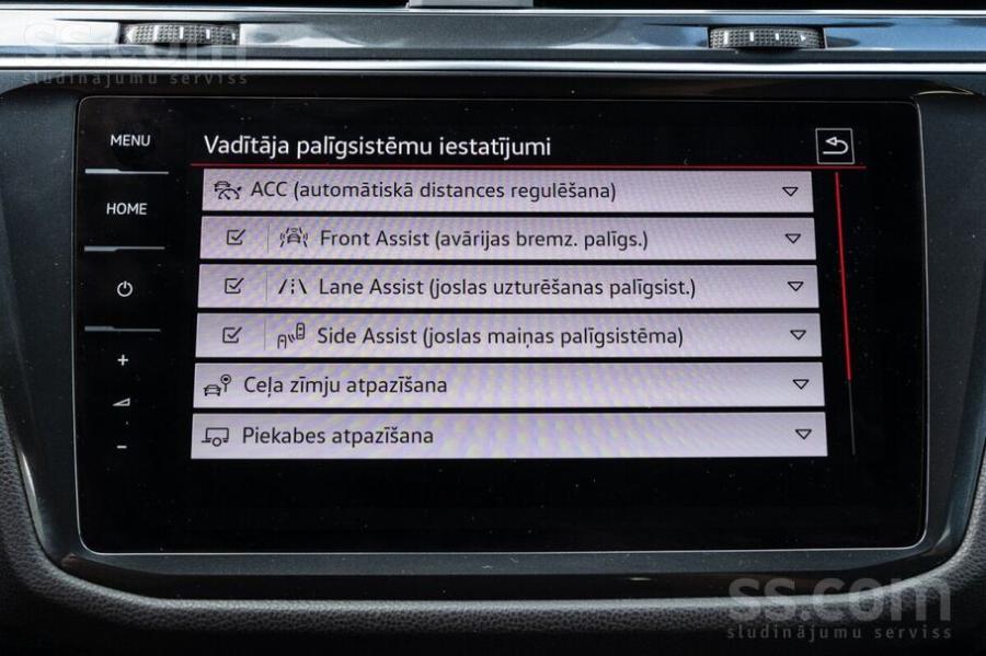 White Volkswagen Tiguan 2022 in Riga, with an engine capacity of 2.00 L and mileage of 86 thousand km for 28950 €, photo 22 on AUTOMOTO.COM.LV