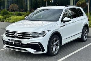 White Volkswagen Tiguan 2022 in Vilnius, with an engine capacity of 1.98 L and mileage of 115 thousand km for 26950 €, photo  on AUTOMOTO.COM.LV