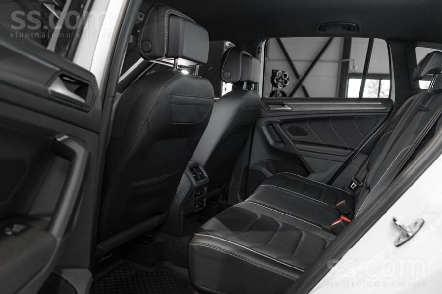 White Volkswagen Tiguan 2023 in Riga, with an engine capacity of 2.00 L and mileage of 120 thousand km for 31500 €, photo 15 on AUTOMOTO.COM.LV