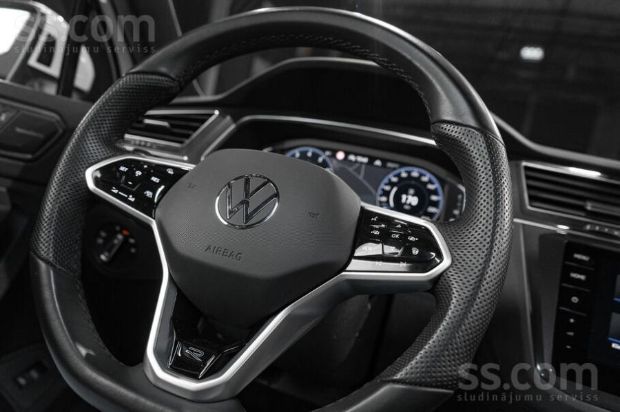 White Volkswagen Tiguan 2023 in Riga, with an engine capacity of 2.00 L and mileage of 120 thousand km for 31500 €, photo 25 on AUTOMOTO.COM.LV