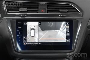 White Volkswagen Tiguan 2023 in Riga, with an engine capacity of 2.00 L and mileage of 120 thousand km for 31500 €, photo 29 on AUTOMOTO.COM.LV