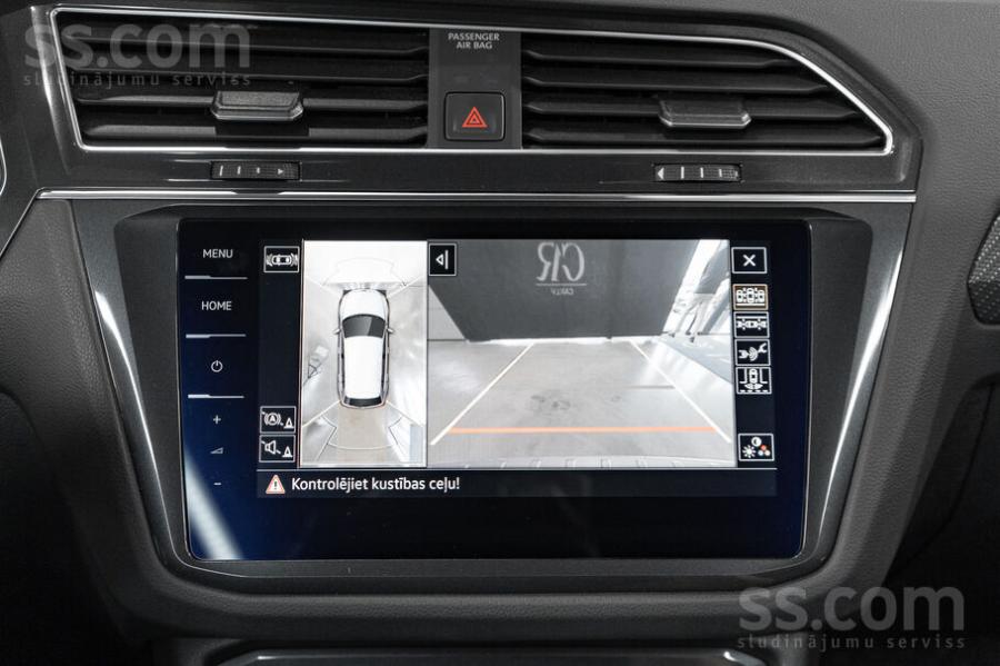 White Volkswagen Tiguan 2023 in Riga, with an engine capacity of 2.00 L and mileage of 120 thousand km for 31500 €, photo 29 on AUTOMOTO.COM.LV