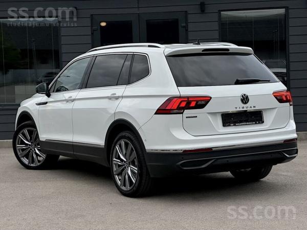 White Volkswagen Tiguan 2023 in Jelgava, with an engine capacity of 2.00 L and mileage of 170 thousand km for 24500 €, photo 2 on AUTOMOTO.COM.LV