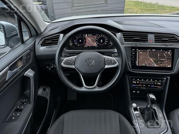 White Volkswagen Tiguan 2023 in Jelgava, with an engine capacity of 2.00 L and mileage of 170 thousand km for 24500 €, photo 7 on AUTOMOTO.COM.LV