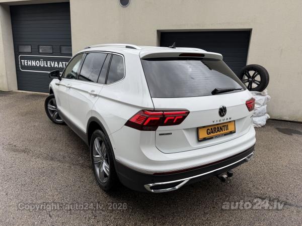 White Volkswagen Tiguan 2023 in Parnu, with an engine capacity of 2.00 L and mileage of 125 thousand km for 29990 €, photo 3 on AUTOMOTO.COM.LV